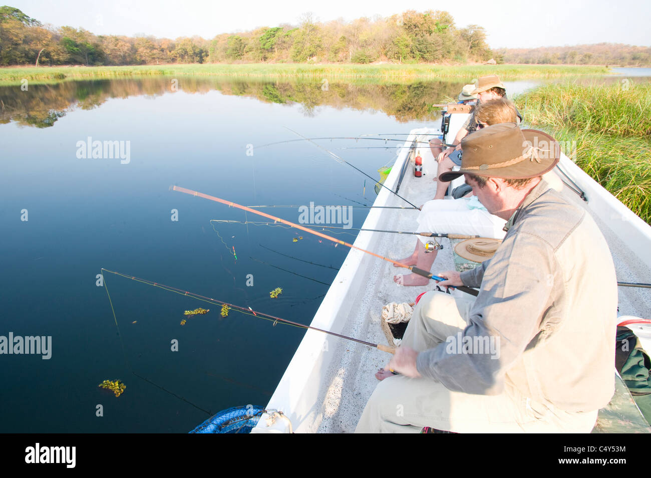 Visitors fish on Zimbabwe's Lake Kariba Stock Photo - Alamy