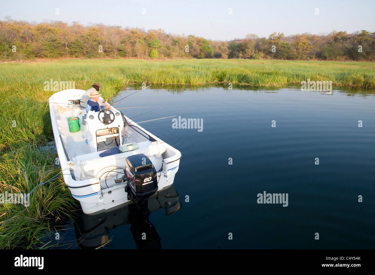 Visitors fish on Zimbabwe's Lake Kariba Stock Photo - Alamy
