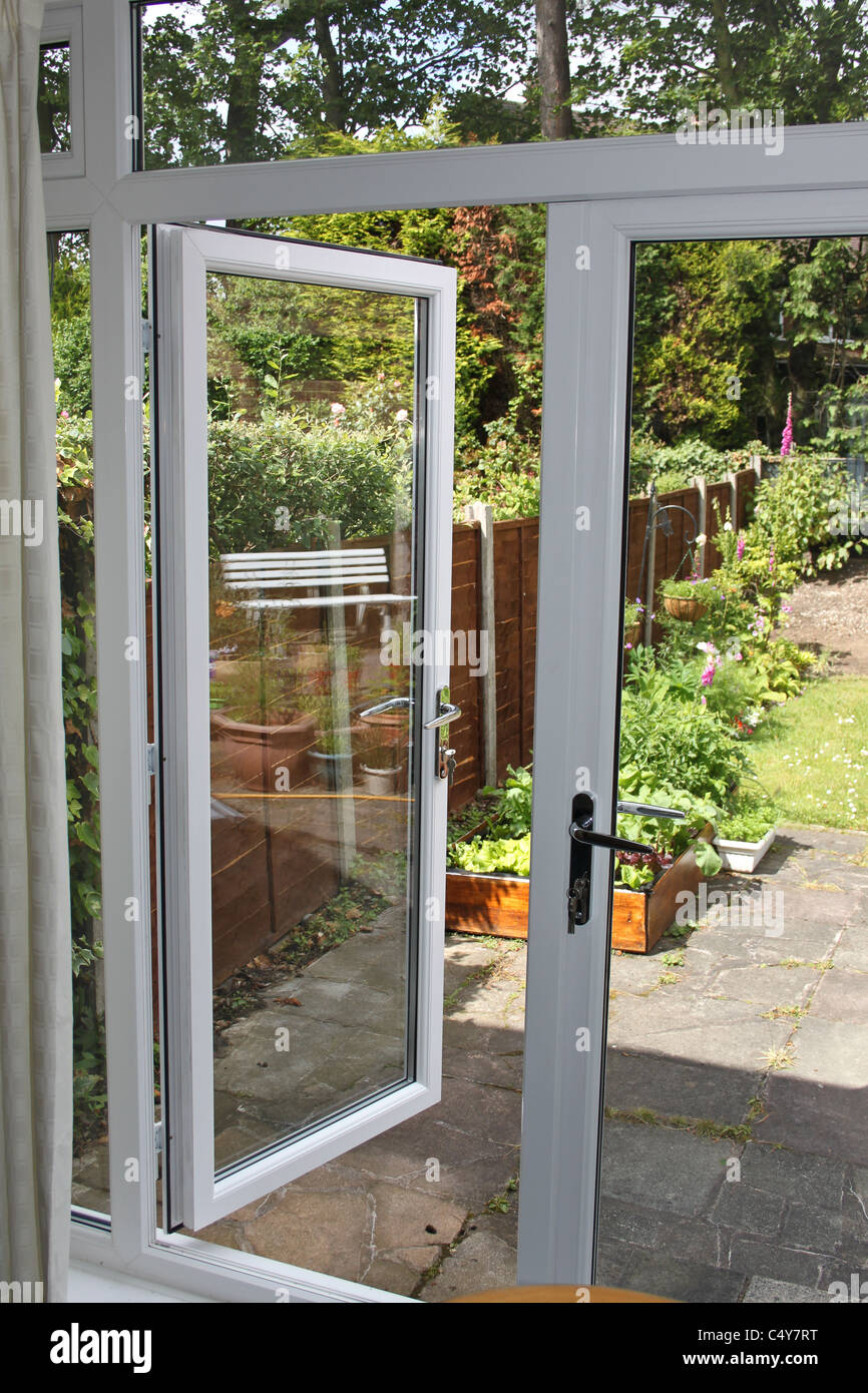 opening and closing new PVC windows and doors Stock Photo - Alamy