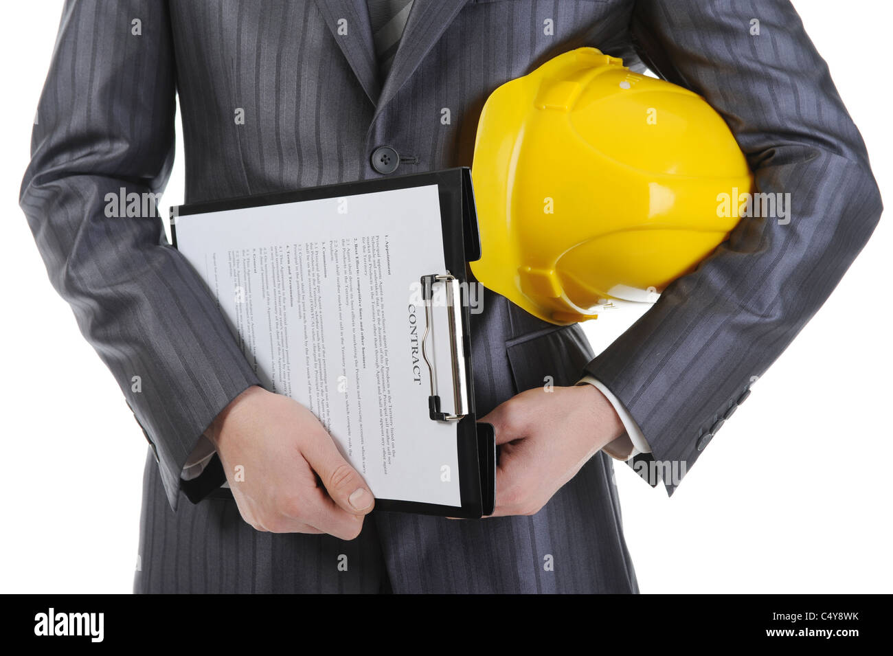 Businessman with construction helmet Stock Photo - Alamy