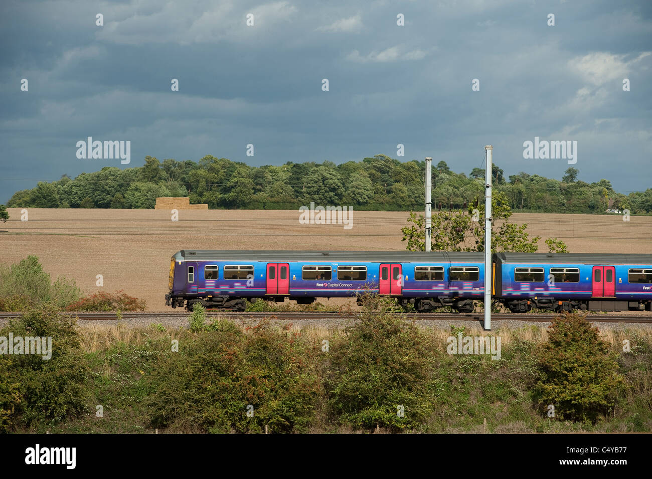 Class 319 train in First Capital Connect livery travelling through the ...