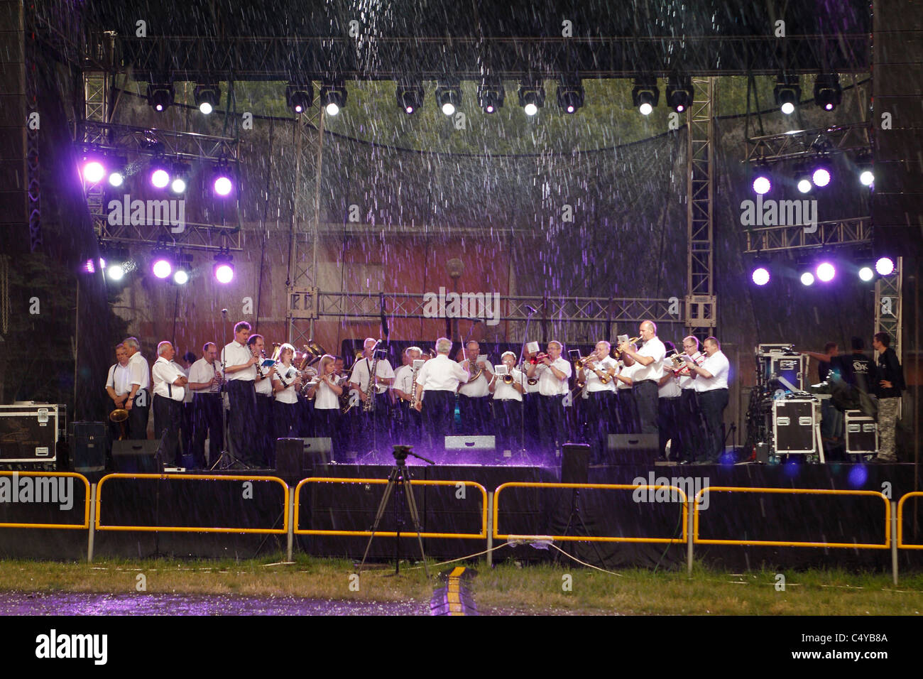 Open air concert by the brass orchestra during heavy rain Stock Photo ...
