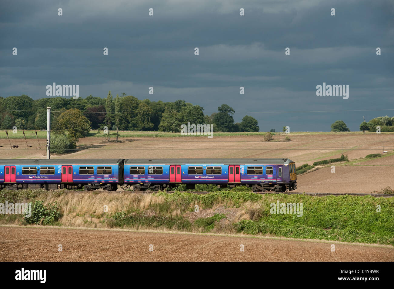 Class 319 train in First Capital Connect livery travelling through the ...