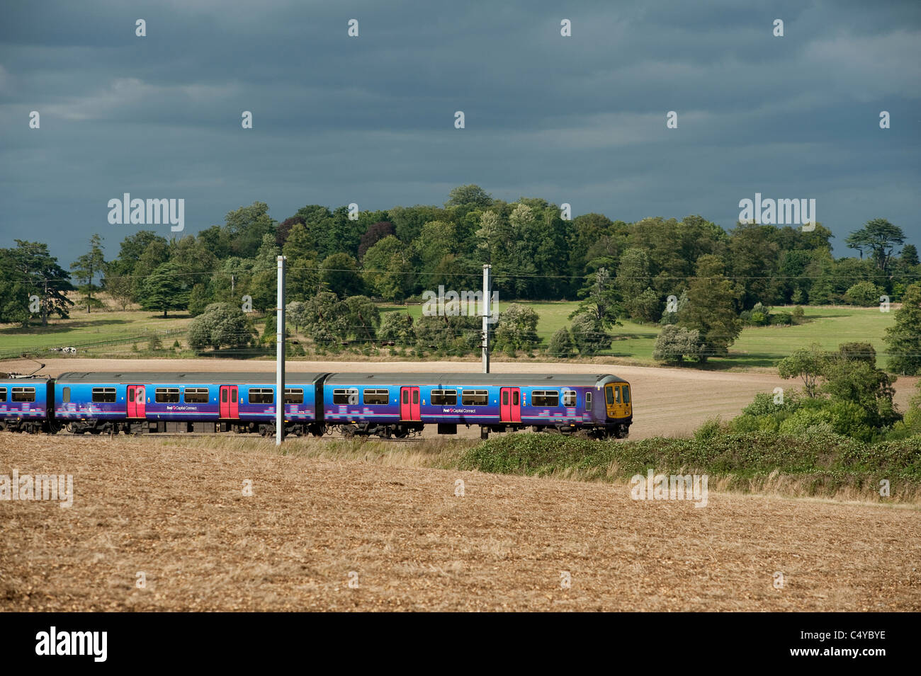Class 319 train in First Capital Connect livery travelling through the ...