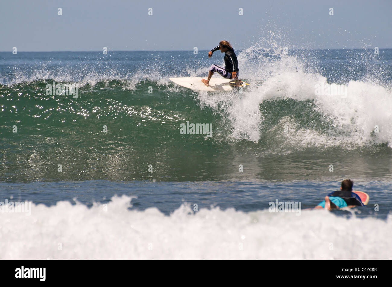 Adult male surfer rides wave hi-res stock photography and images - Alamy