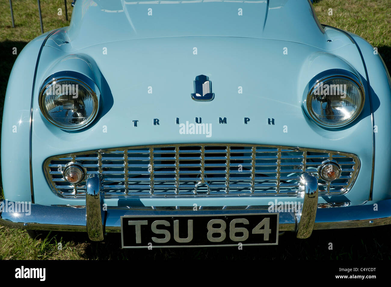 Sky blue Triumph TR3 front grill and headlights Stock Photo - Alamy