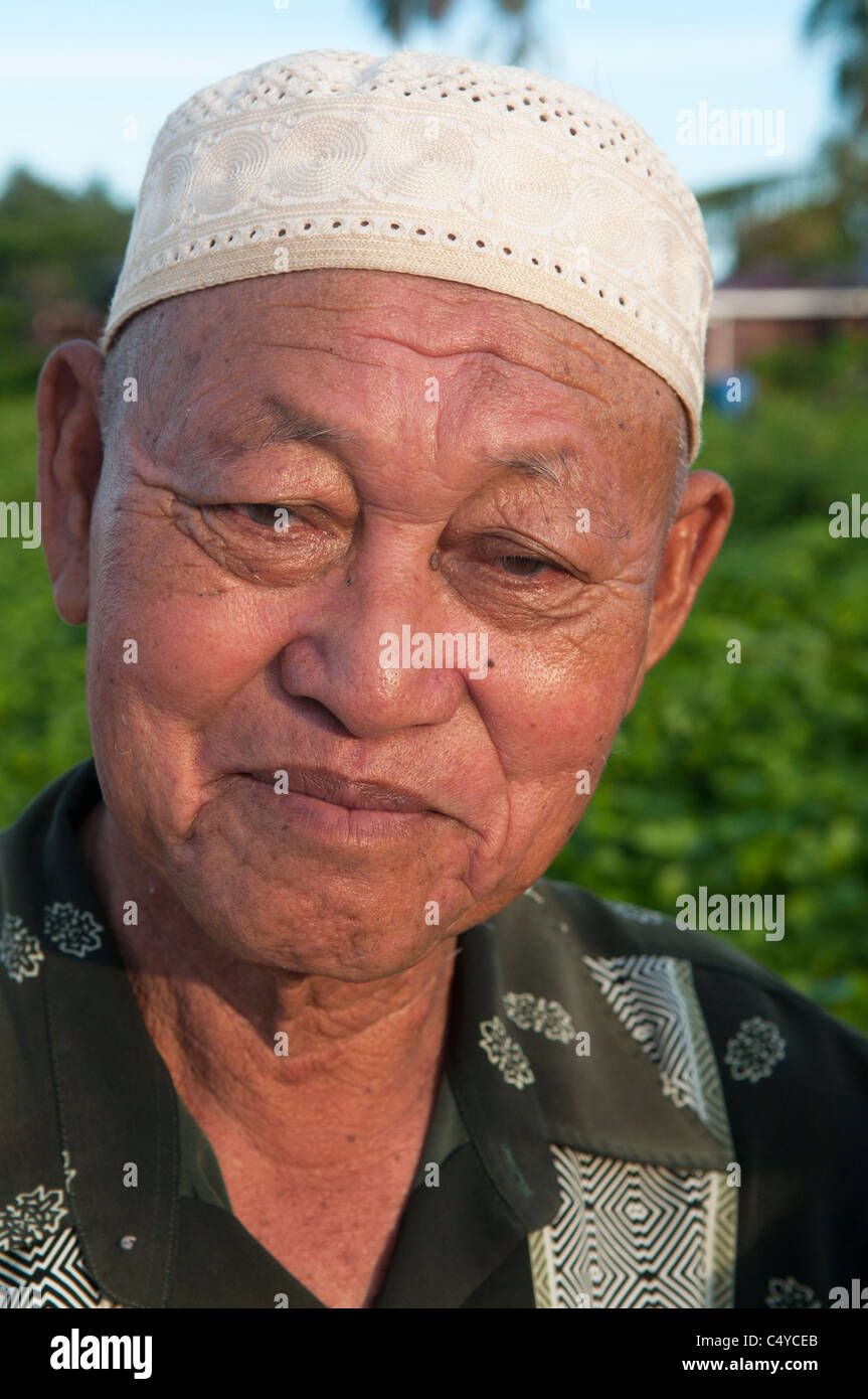 Muslim Sulu refugee man on Mabul Island, Borneo, Malaysia Stock Photo ...