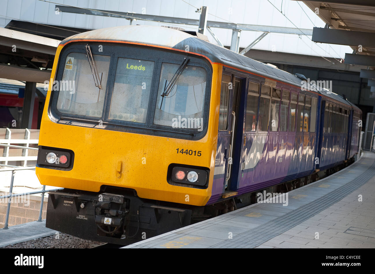Class 144 pacer train in Northern Rail livery leaving a railway station ...