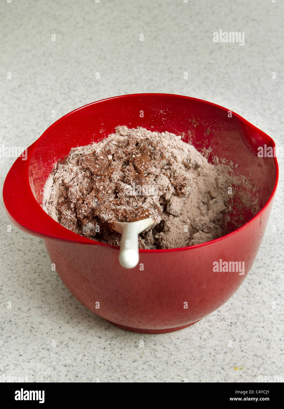 cookie batter in a red mixing bowl Stock Photo - Alamy