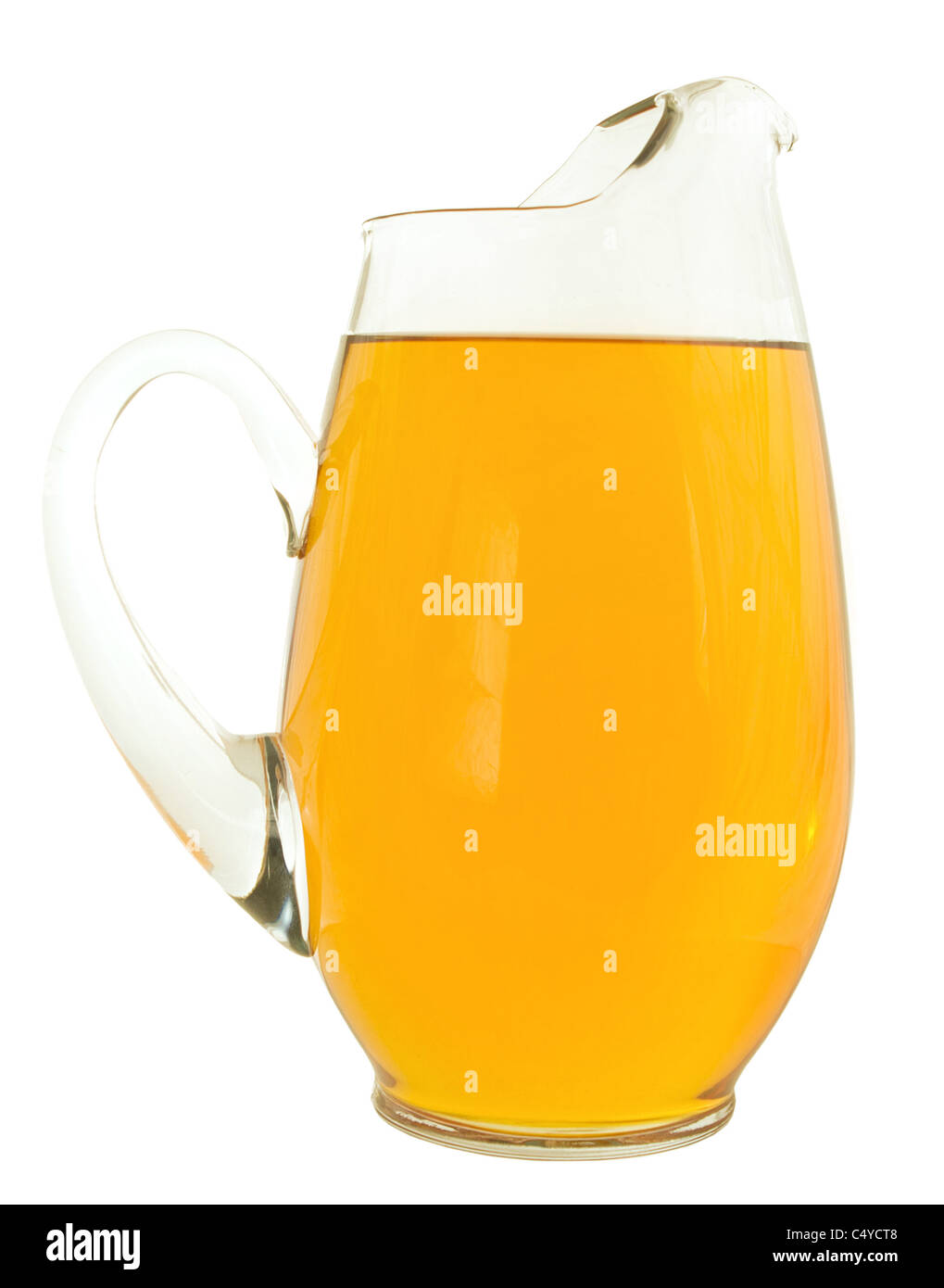 one full glass pitcher of apple juice over white Stock Photo - Alamy