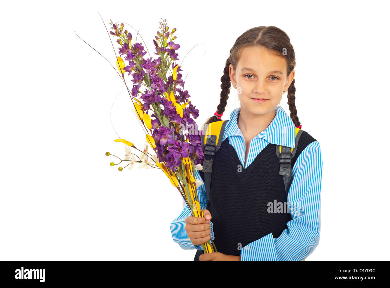 Schoolgirl in first day of school holding flowers isolated on white ...
