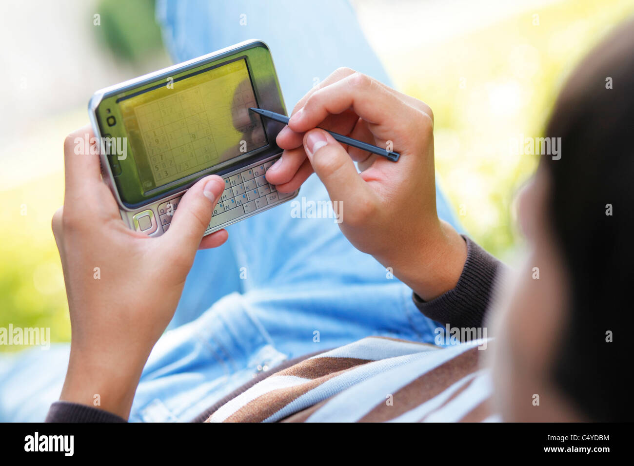 Male hand with digitized pen, touching the screen of a PDA Stock Photo ...