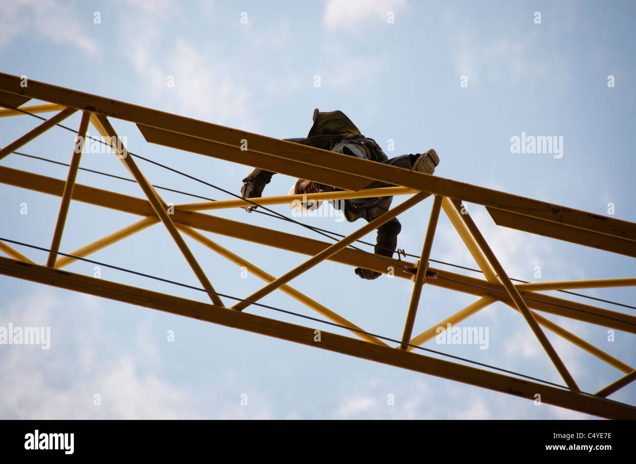 Man working on a crane Stock Photo - Alamy