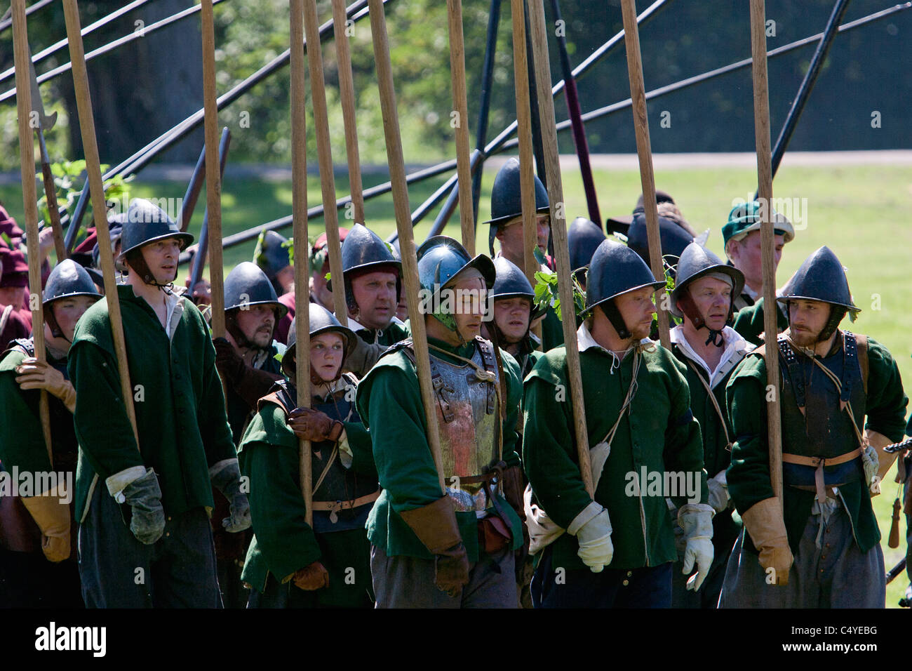 Members of the English Civil War Society clash during a battle re ...