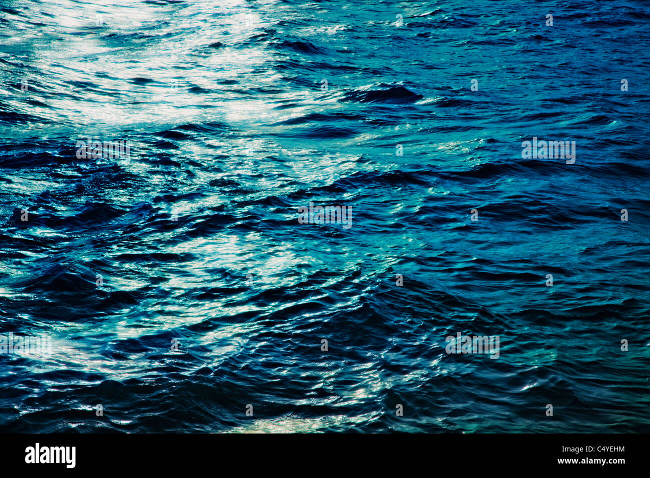 Water surface of the sea at night close up Stock Photo - Alamy