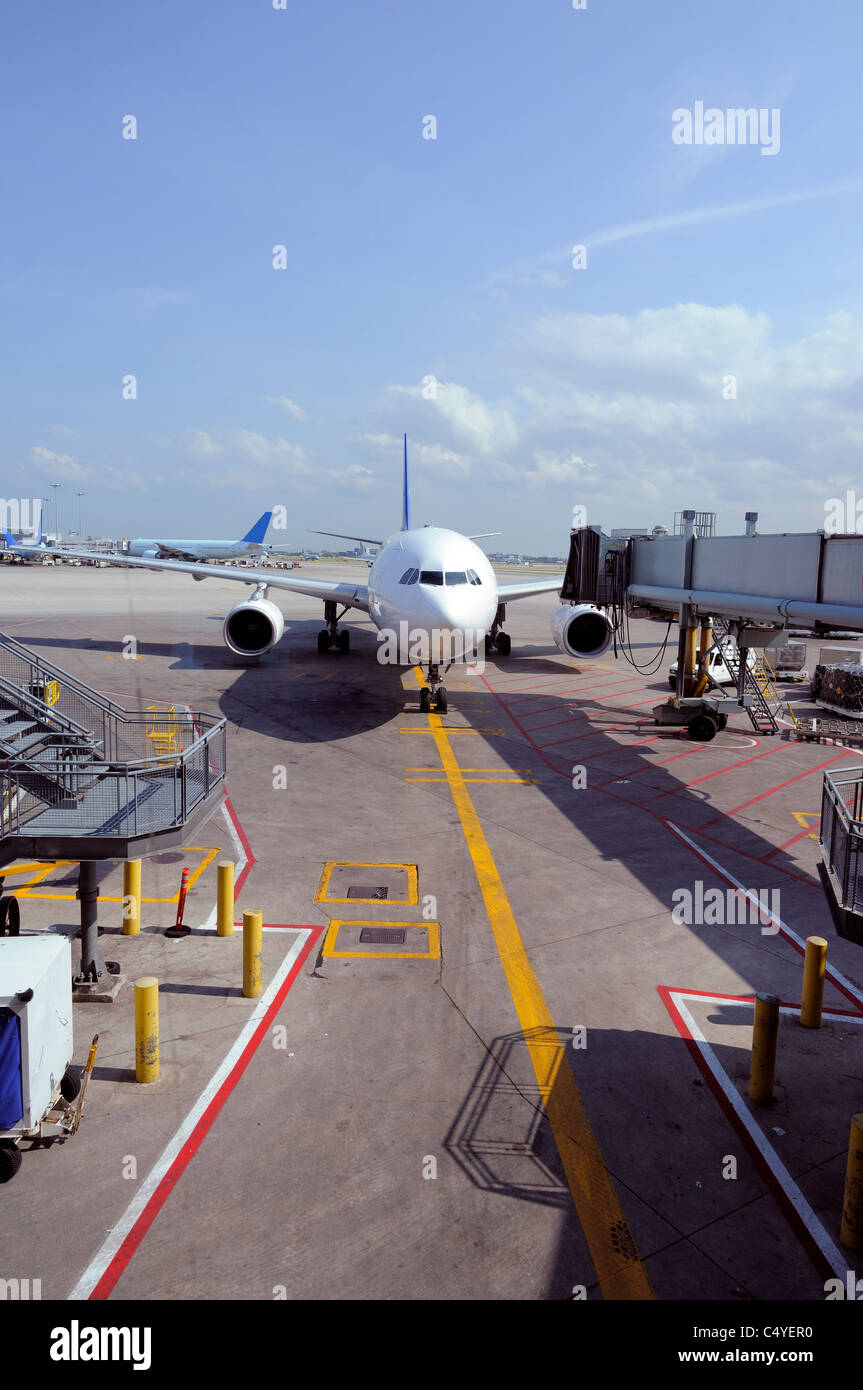 Airbus A310 Aircraft Loading Passengers At An Airport Gate Stock Photo ...