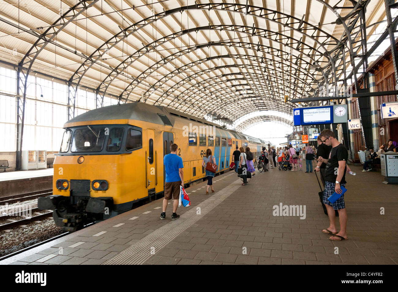 Intercity train to Amsterdam arriving at Haarlem Railway Station ...
