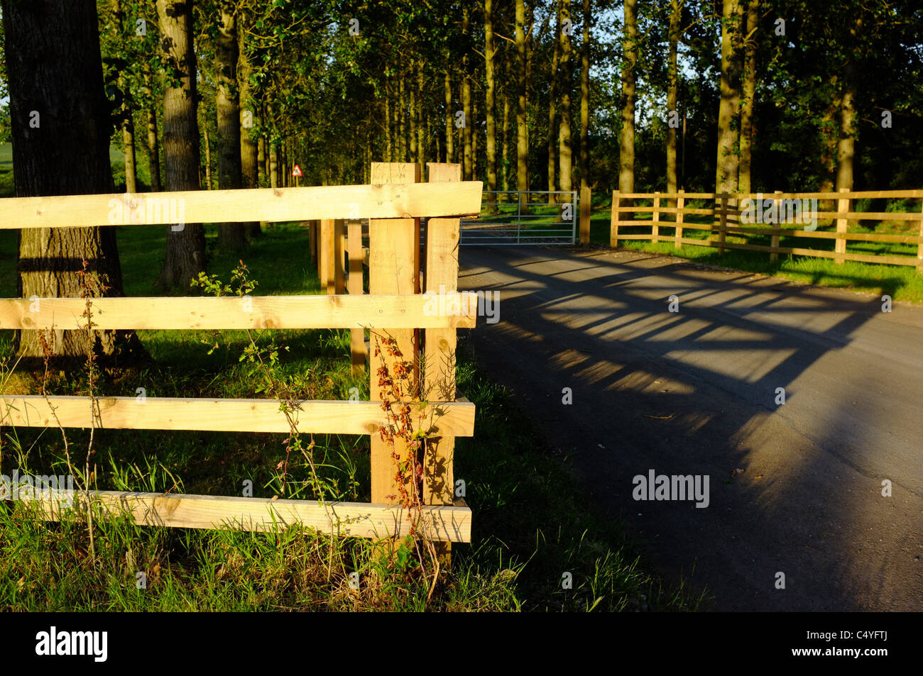 gate fence farm fencing road wooden Stock Photo - Alamy
