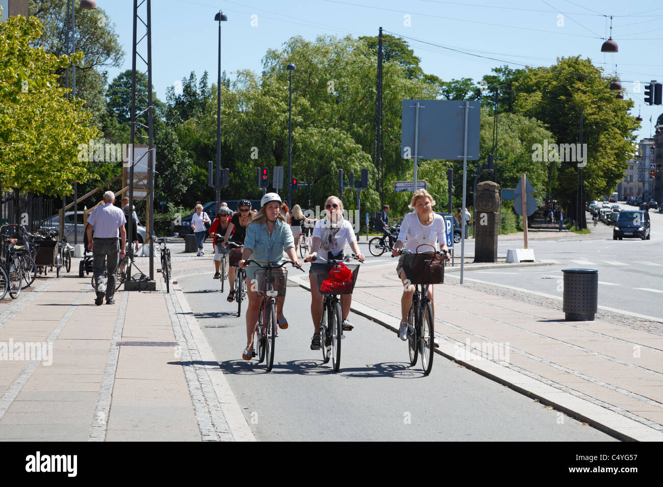 Girls cycling at Østerport in the city of Copenhagen on one of the many ...