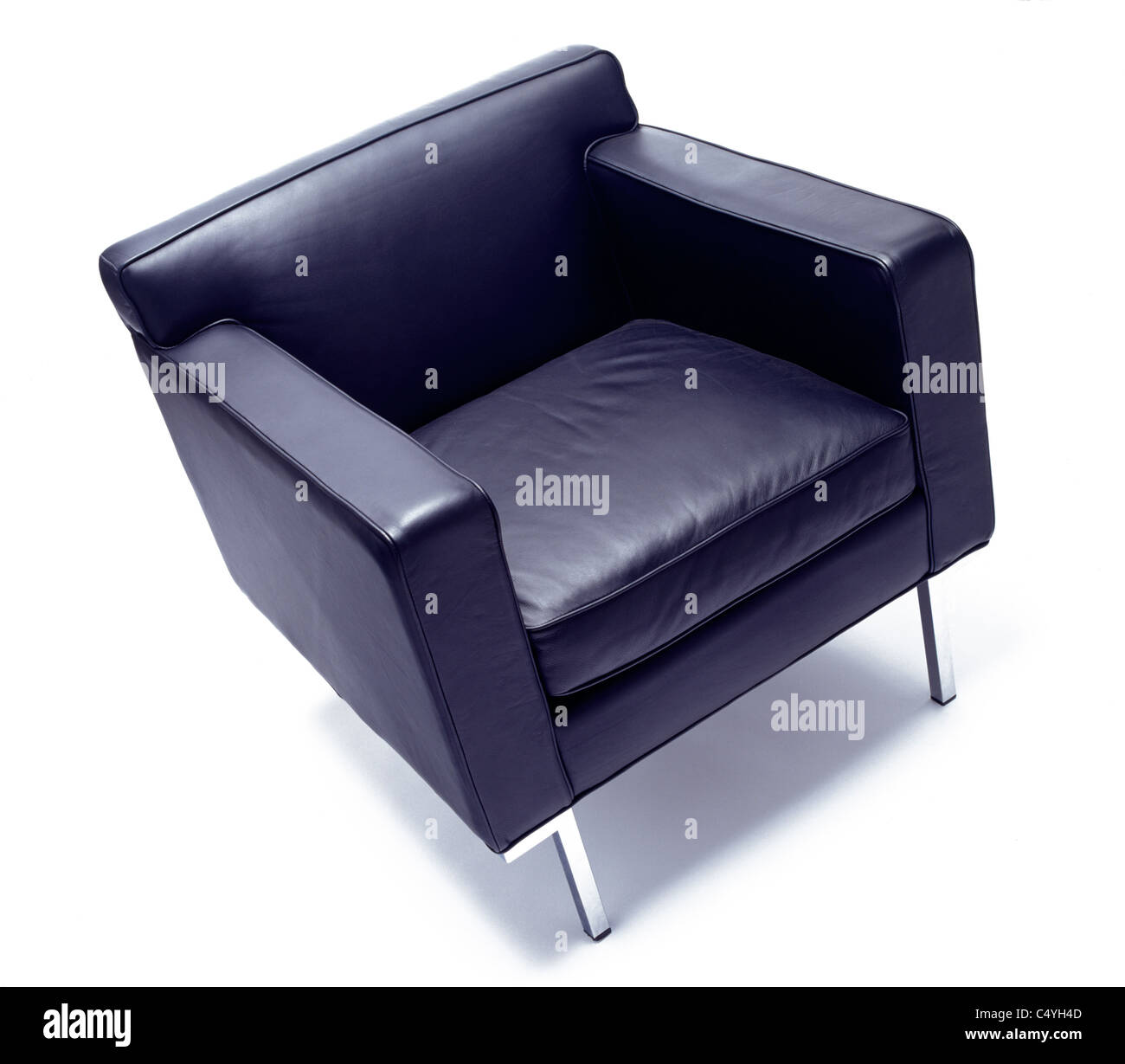 A large comfortable black leather chair Stock Photo - Alamy