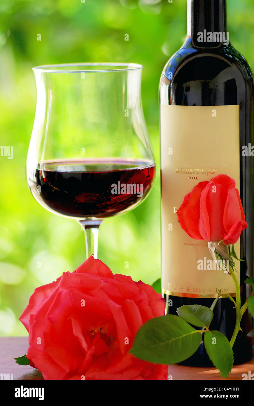 Red roses and red wine Stock Photo - Alamy
