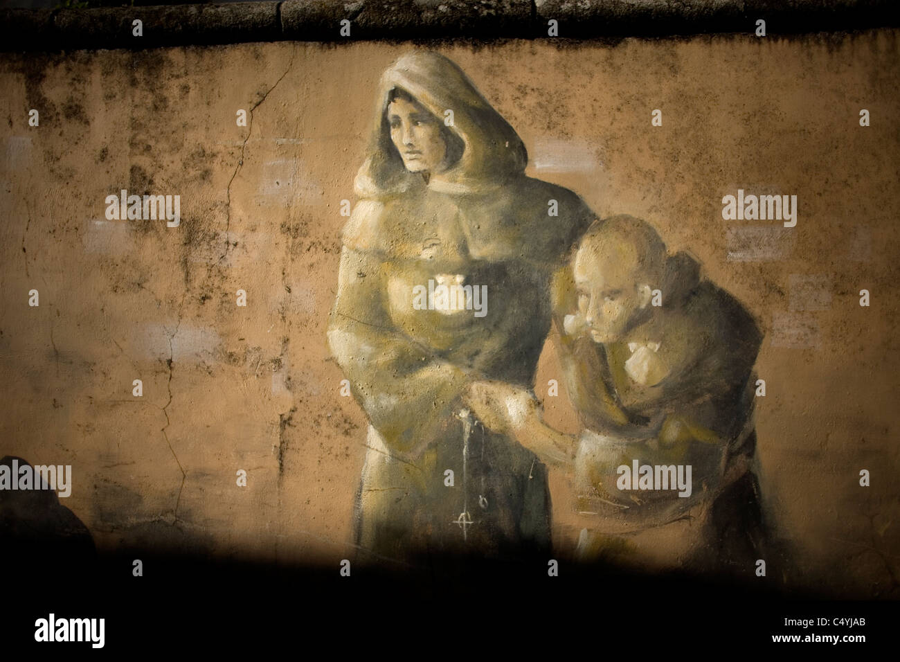 A street mural with Saint James guiding a pilgrim painted in Sarria ...