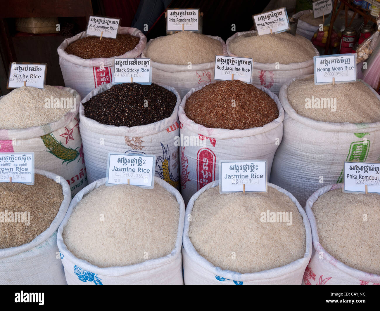 Sacks of red and white jasmine rice, and black and white sticky rice ...