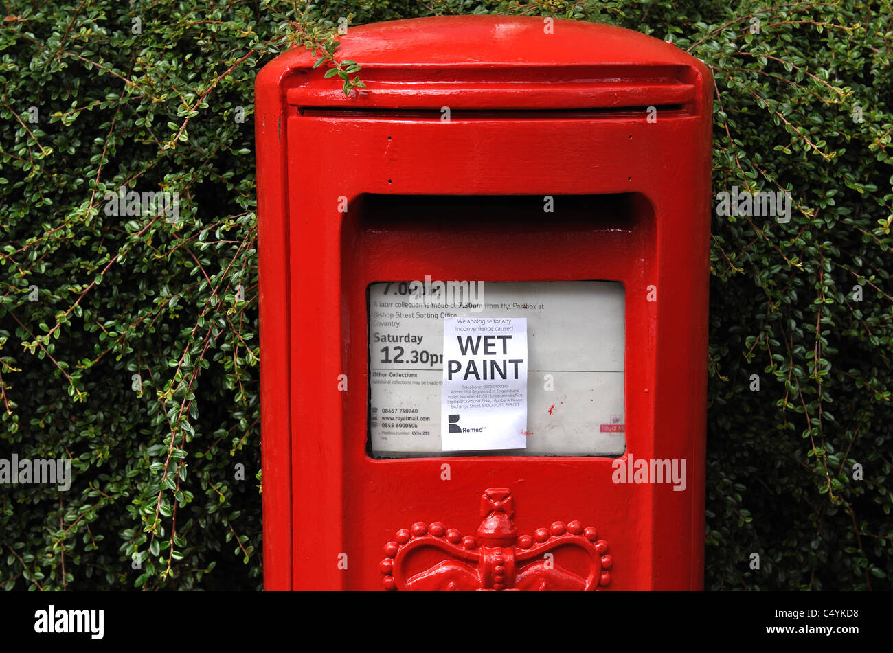 Freshly painted type K post box with wet paint sign Stock Photo - Alamy