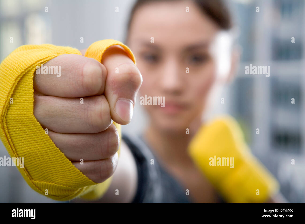 Back view woman raised fist hi-res stock photography and images - Alamy