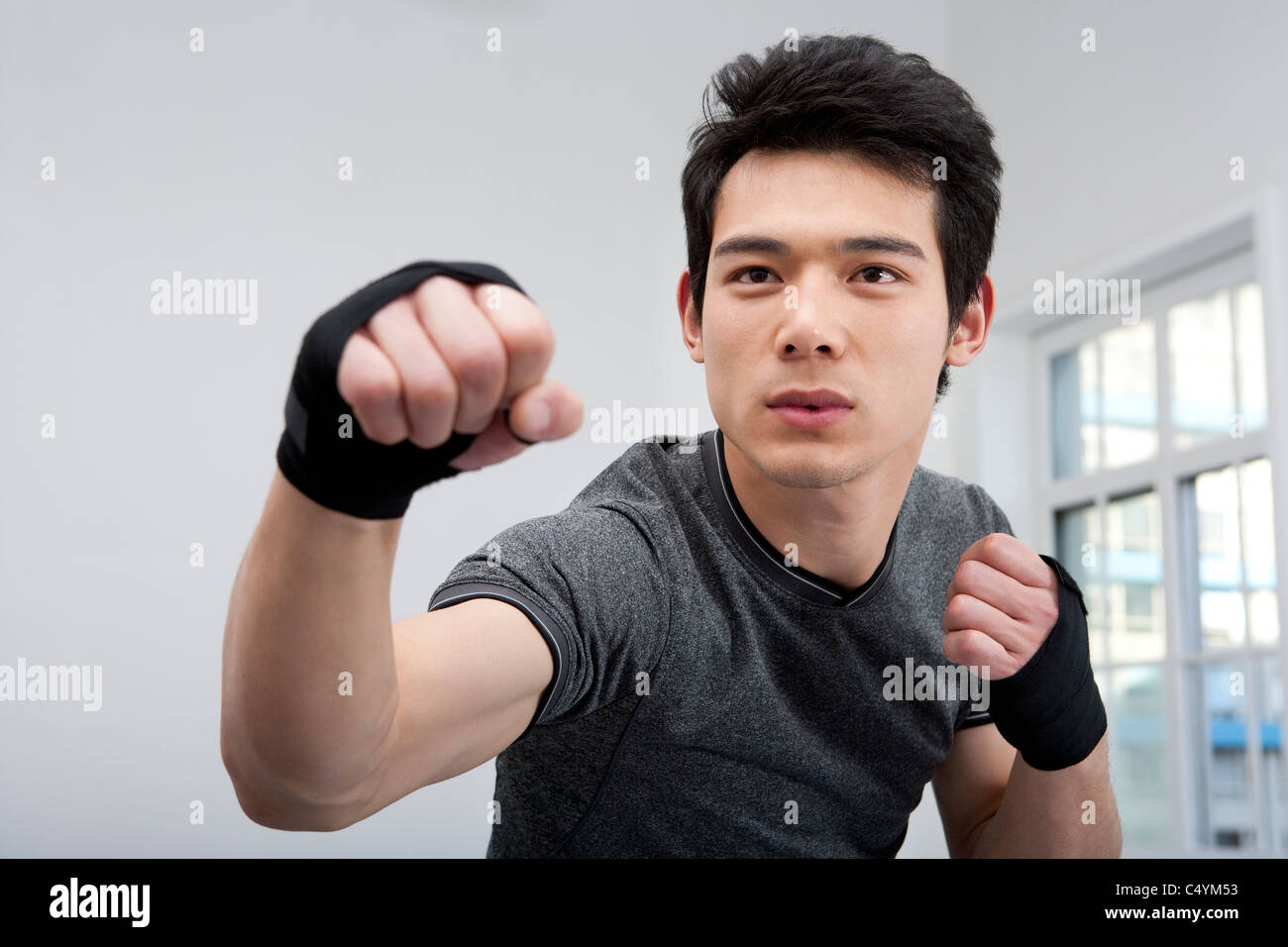 Serious Man in Fighting Stance Stock Photo - Alamy