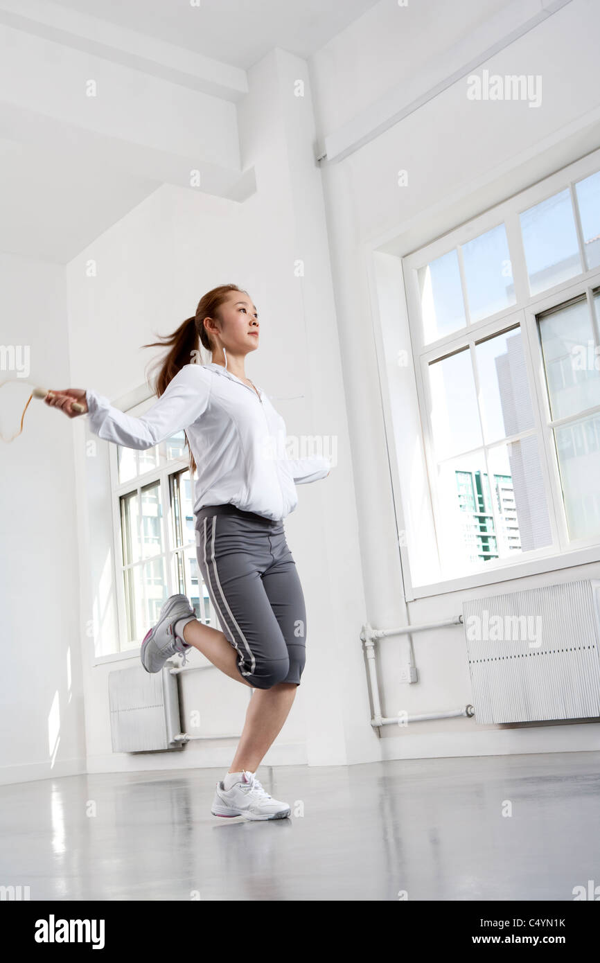 Young Woman Jump Roping Stock Photo - Alamy