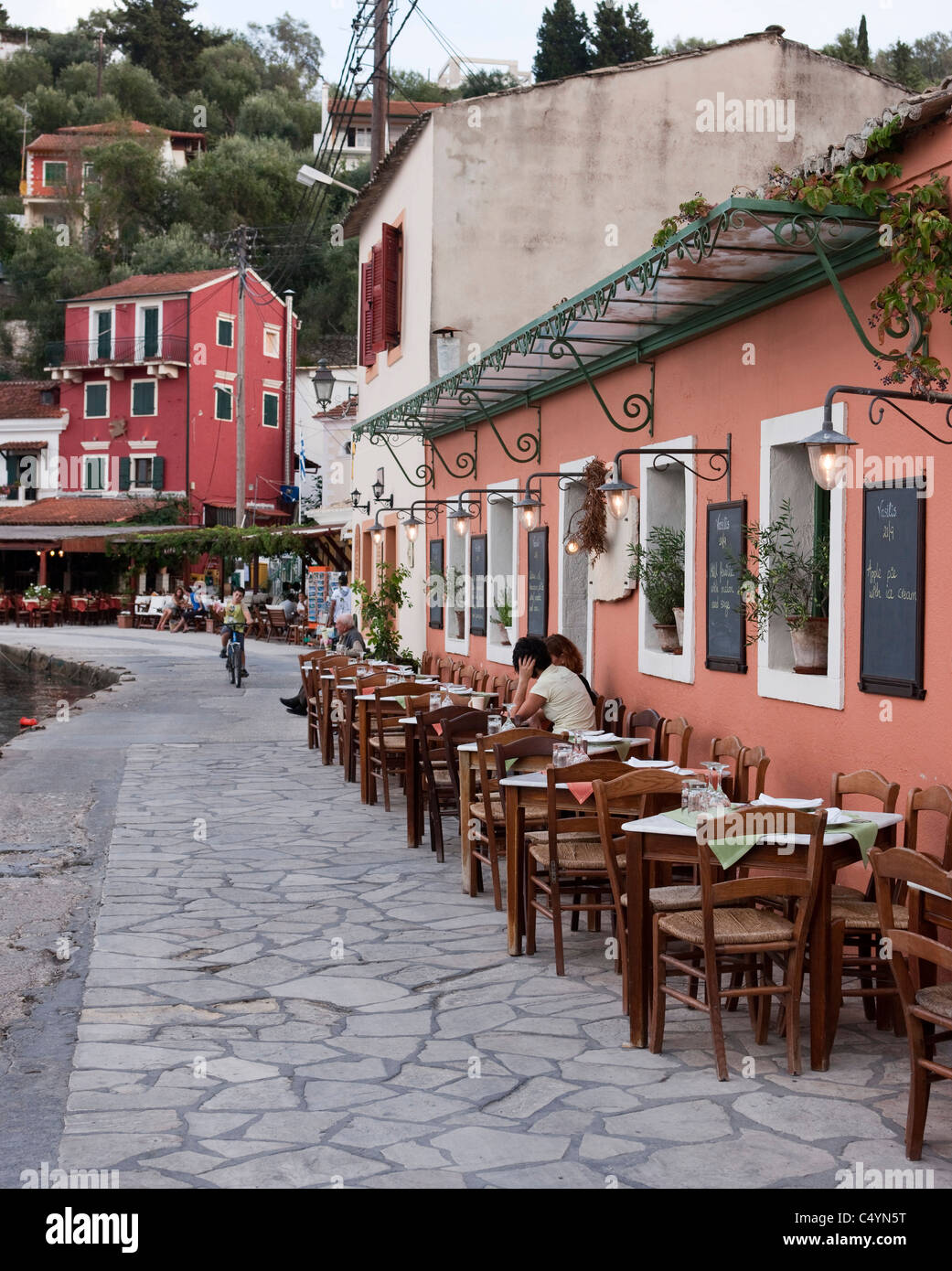 The waterfront restaurants in Loggos. Paxos, Greece Stock Photo - Alamy