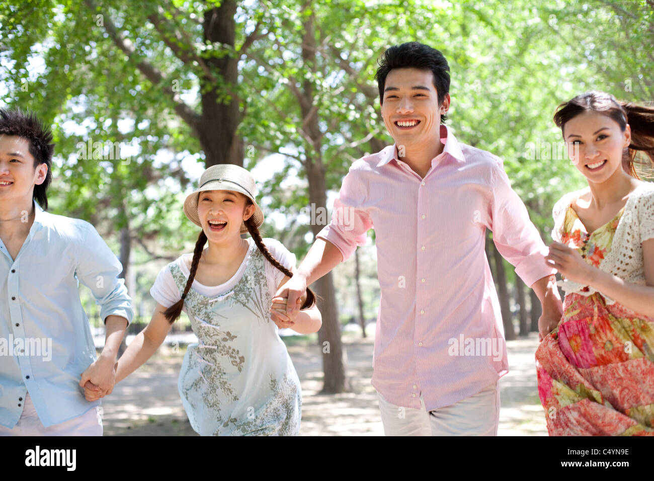 Friends Running at the Park Stock Photo - Alamy