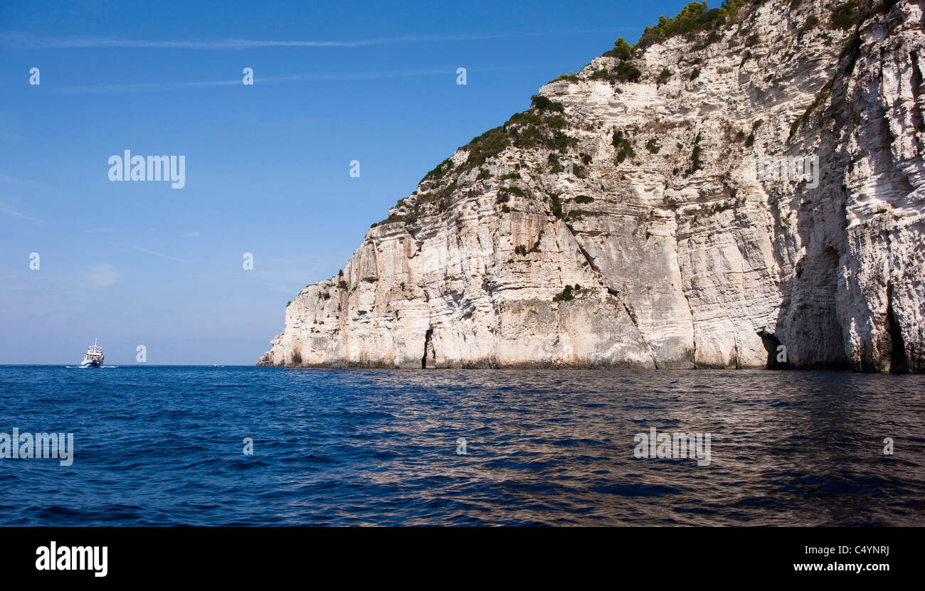 The large lime and sandstone cliffs on the western side of the island ...