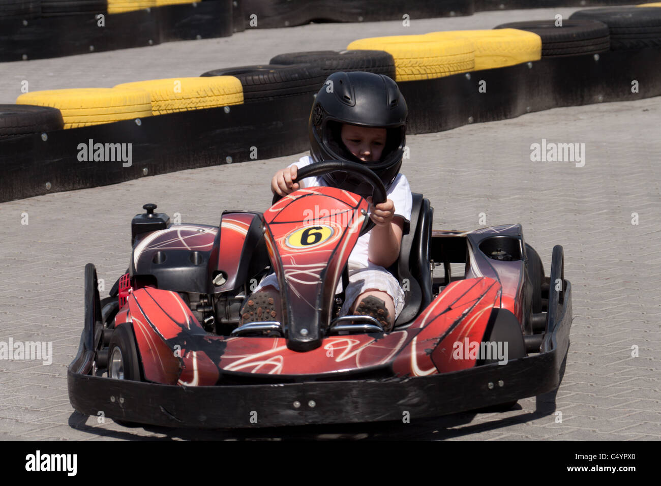driver on circuit, kart riding on the outer circuit Stock Photo - Alamy