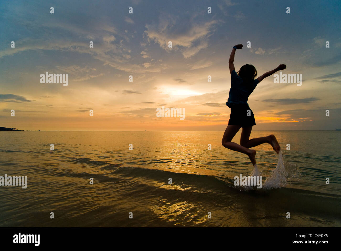Woman leaping silhouette hi-res stock photography and images - Alamy