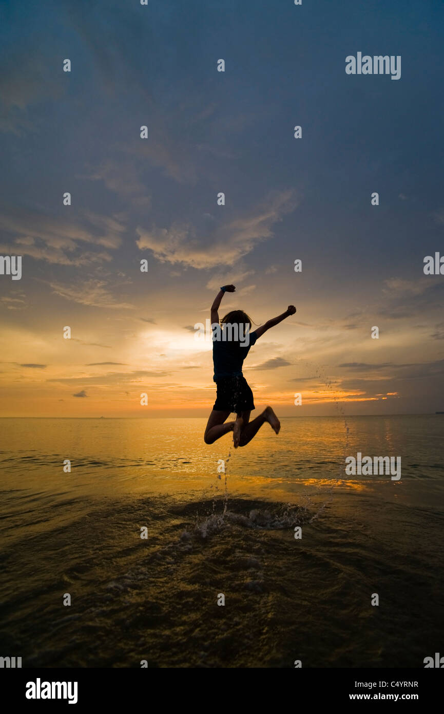 Celebration leaping jumping winner hi-res stock photography and images ...
