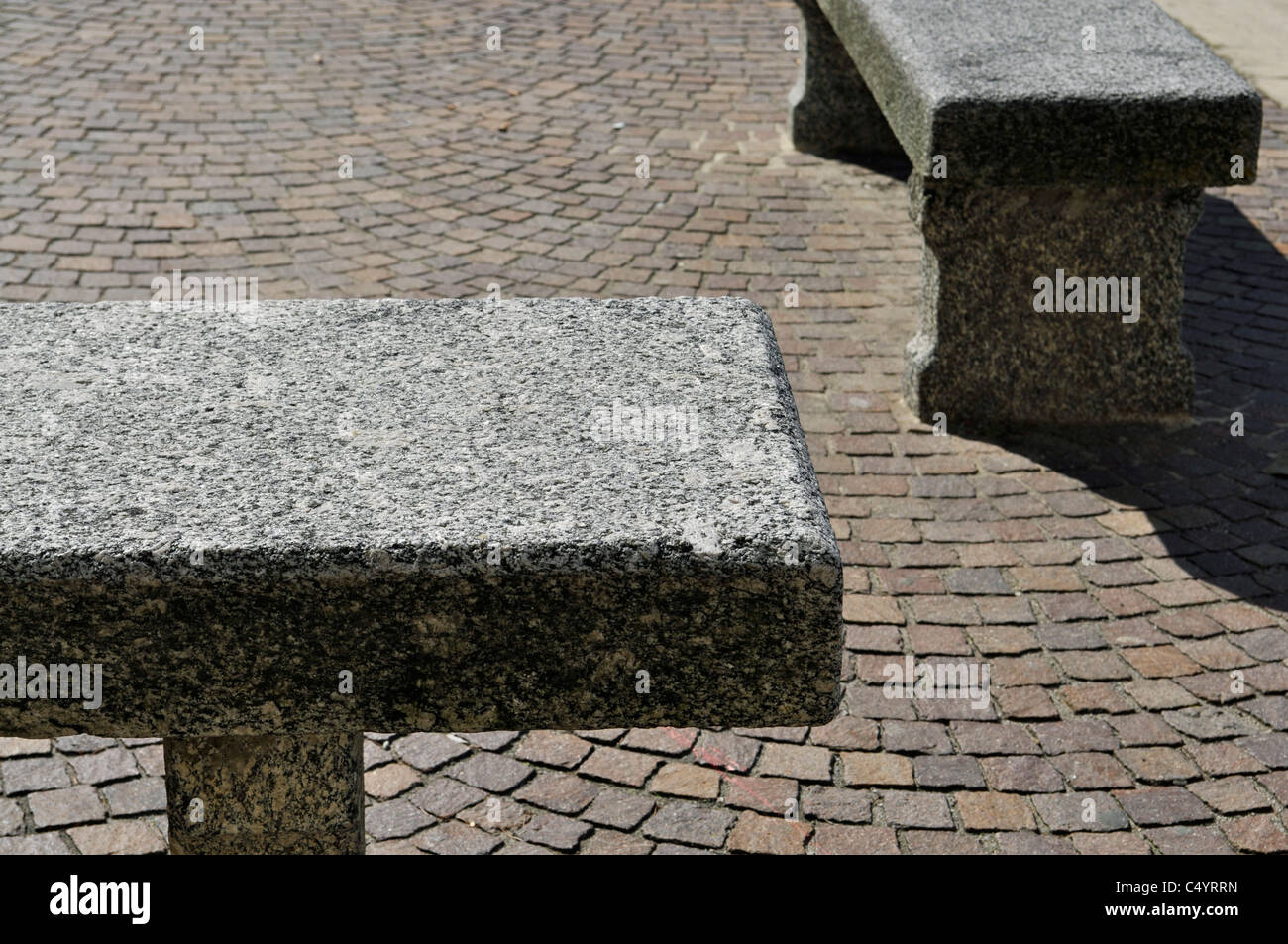 granite stone benches and cobblestoned street Stock Photo - Alamy