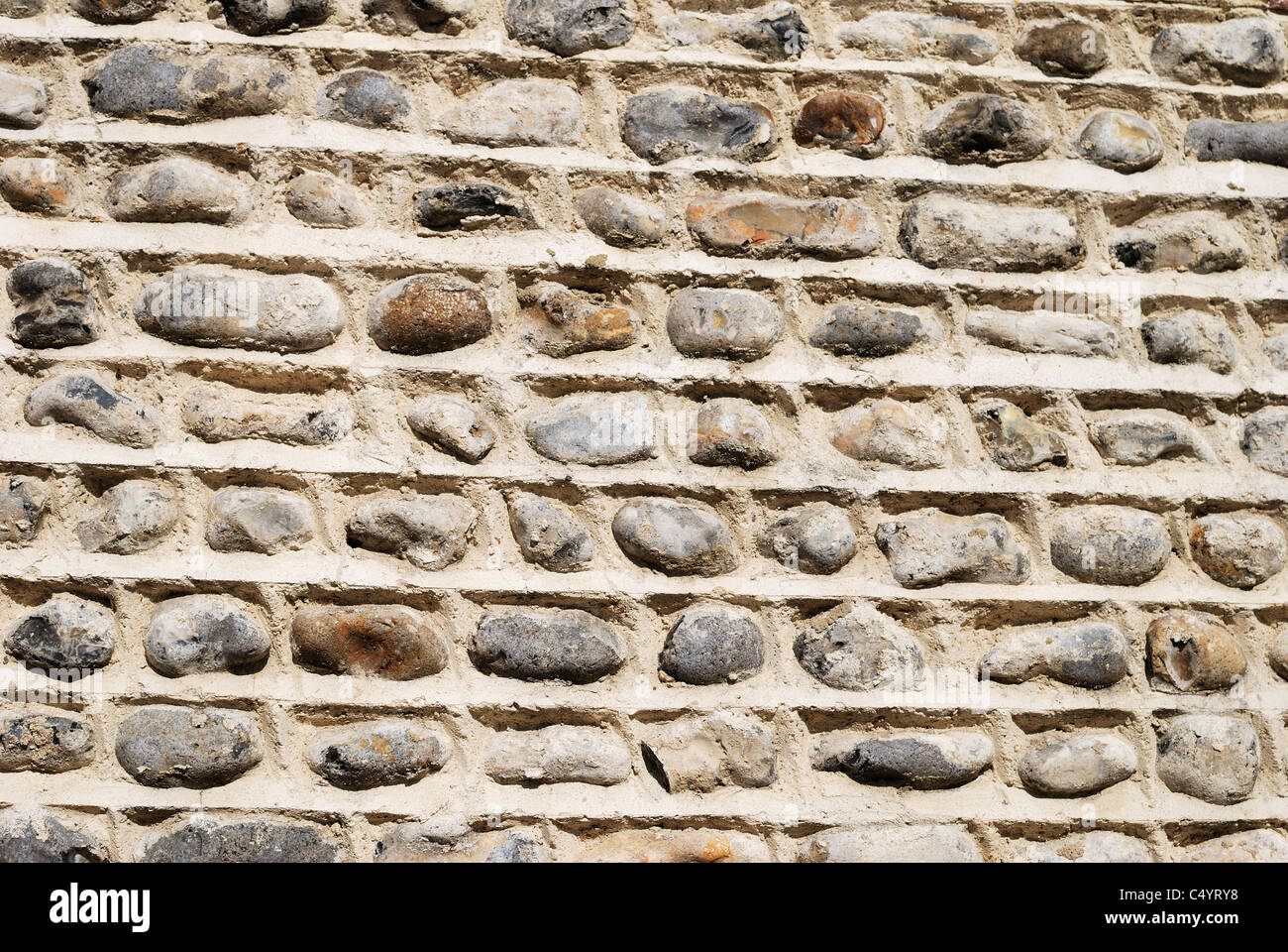 Stone wall rounded stones hi-res stock photography and images - Alamy
