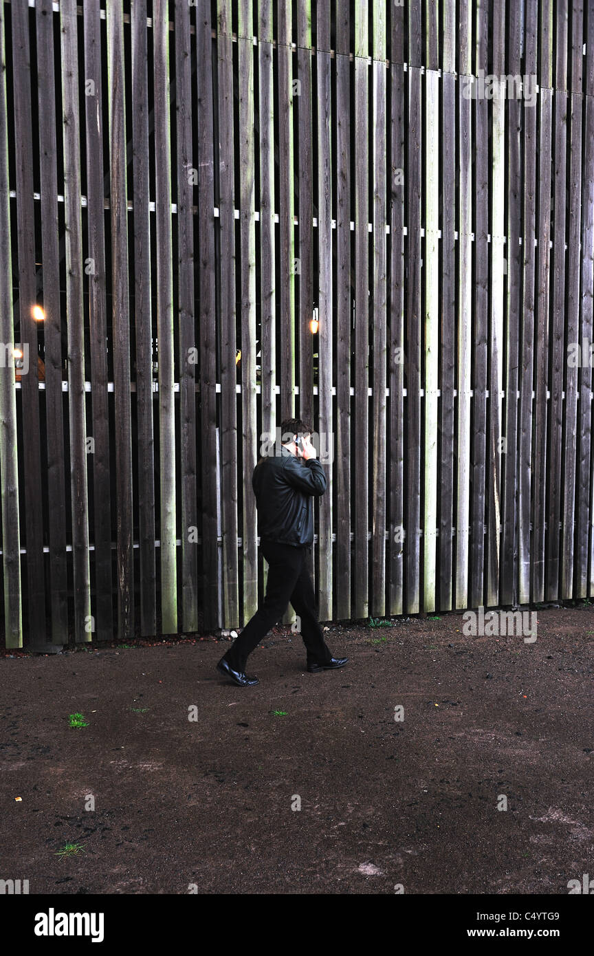 Man walking past on street hi-res stock photography and images - Alamy
