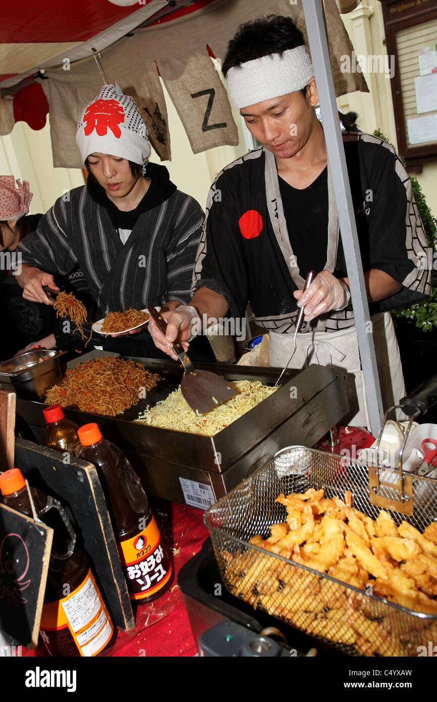Two Japanese chefs cooking up some treats at the Moshi Moshi Japanese ...
