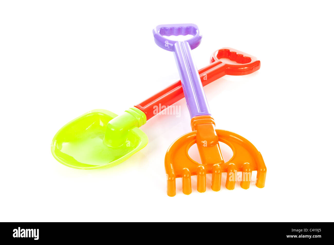 Colorful beach toys; shovel and rake, over white background Stock Photo ...