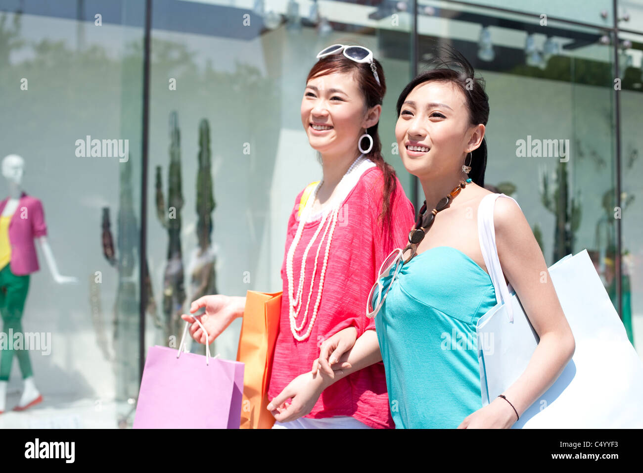 Two Friends Shopping Stock Photo - Alamy