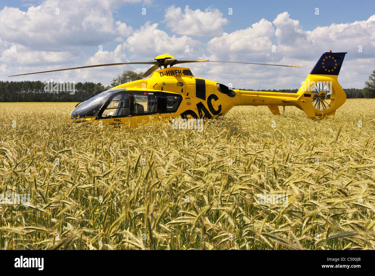 German ADAC Rescue Helicopter in a corn Field Stock Photo - Alamy