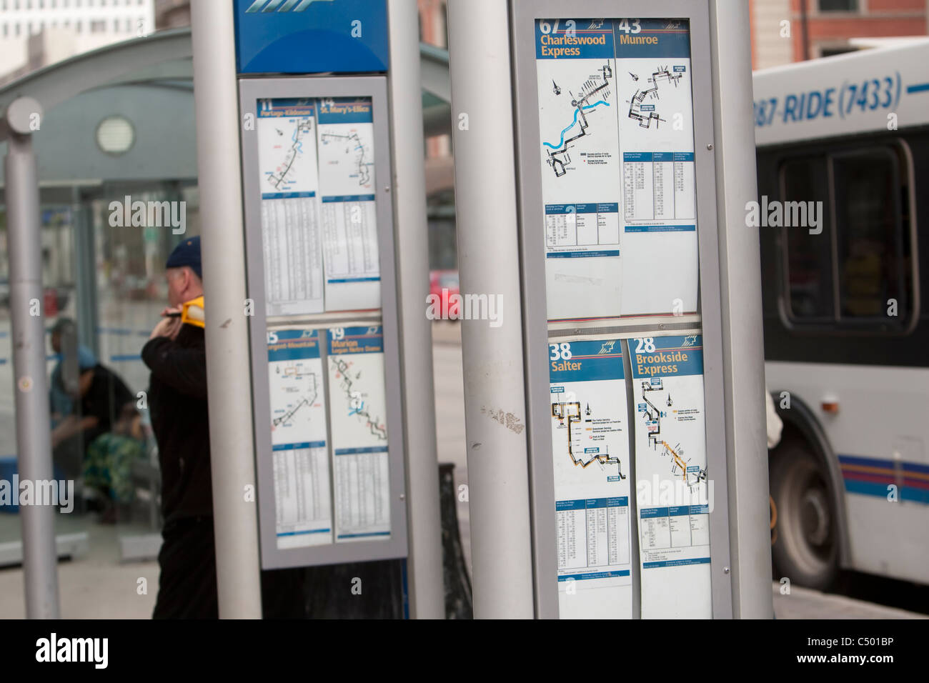 Winnipeg transit bus routes are pictured at a bus stop in Winnipeg ...