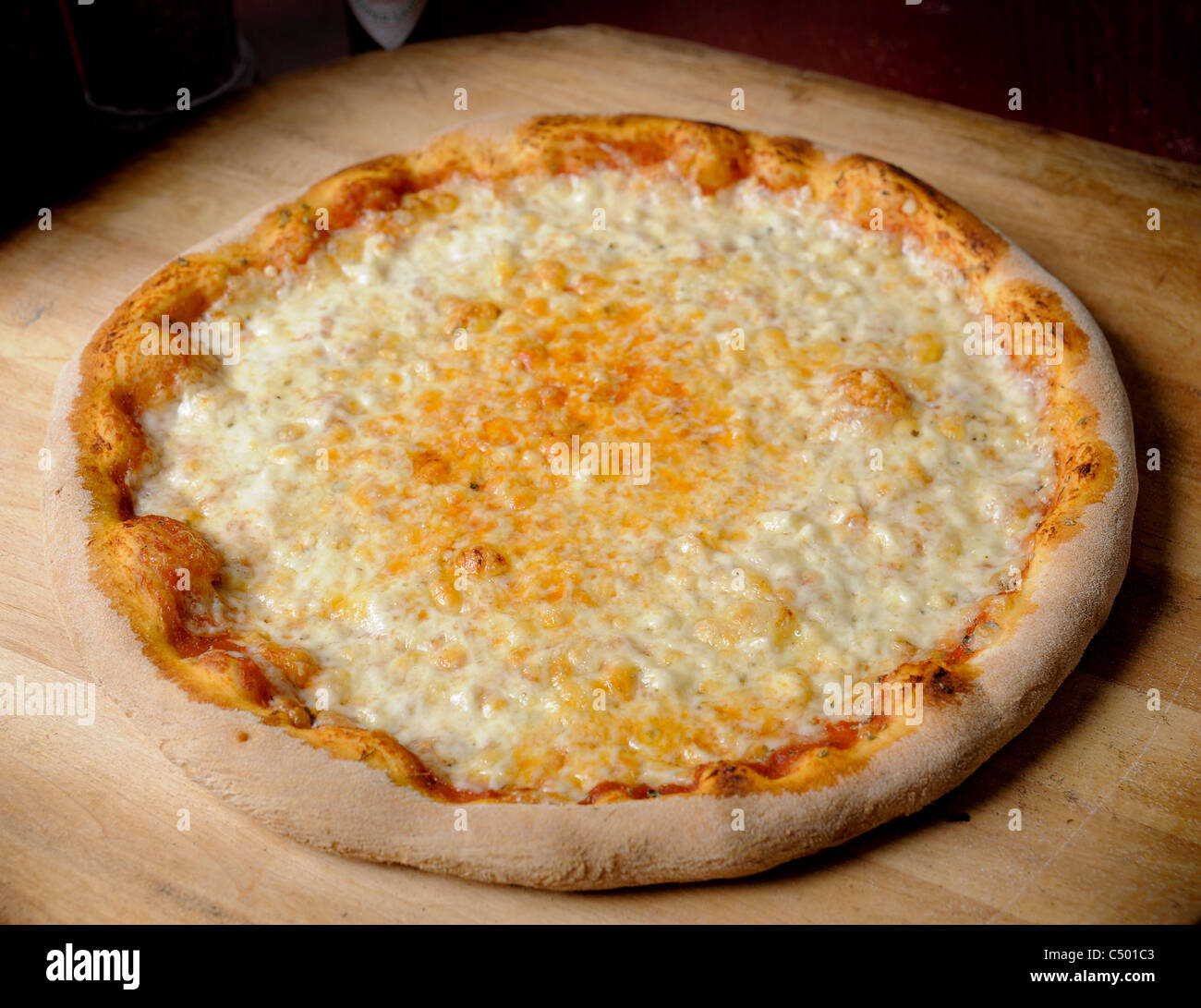 Freshly baked pizza base Stock Photo - Alamy