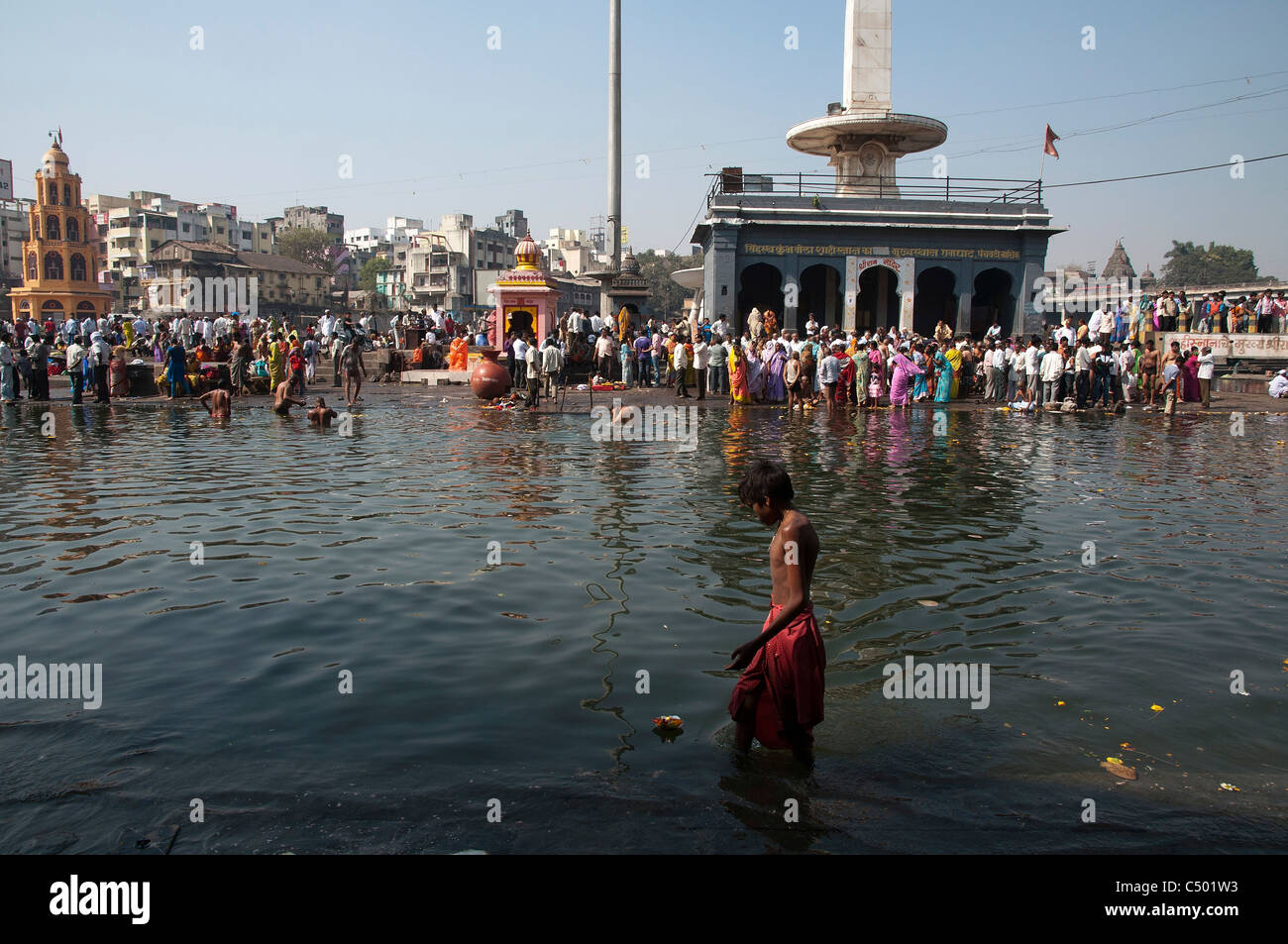 India, Maharashtra, Nashik ritual bathing in the holy the Godavari ...