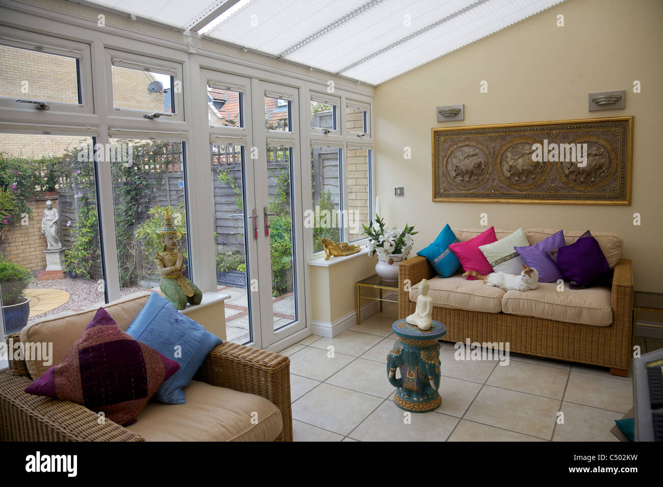 A modern conservatory with PVC window and doorsin Bedfordshire, England ...
