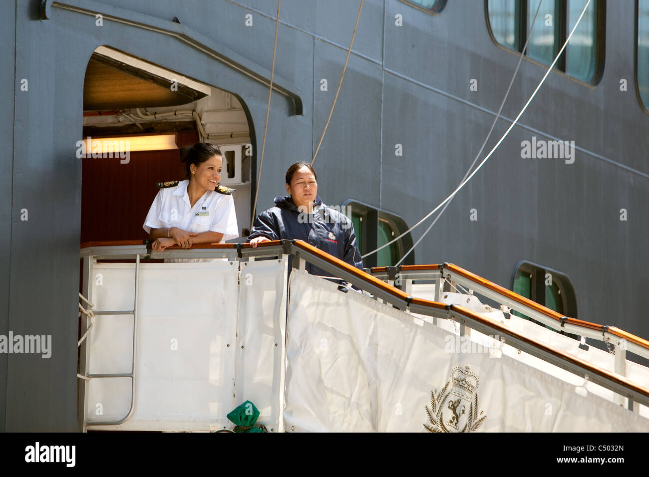 Security staff on duty at top of passenger gangway. Queen Victoria ...