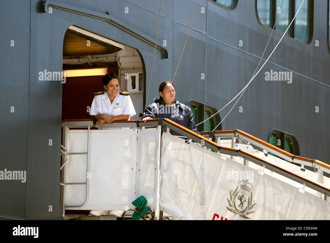 Security staff on duty at top of passenger gangway.Queen Victoria ...